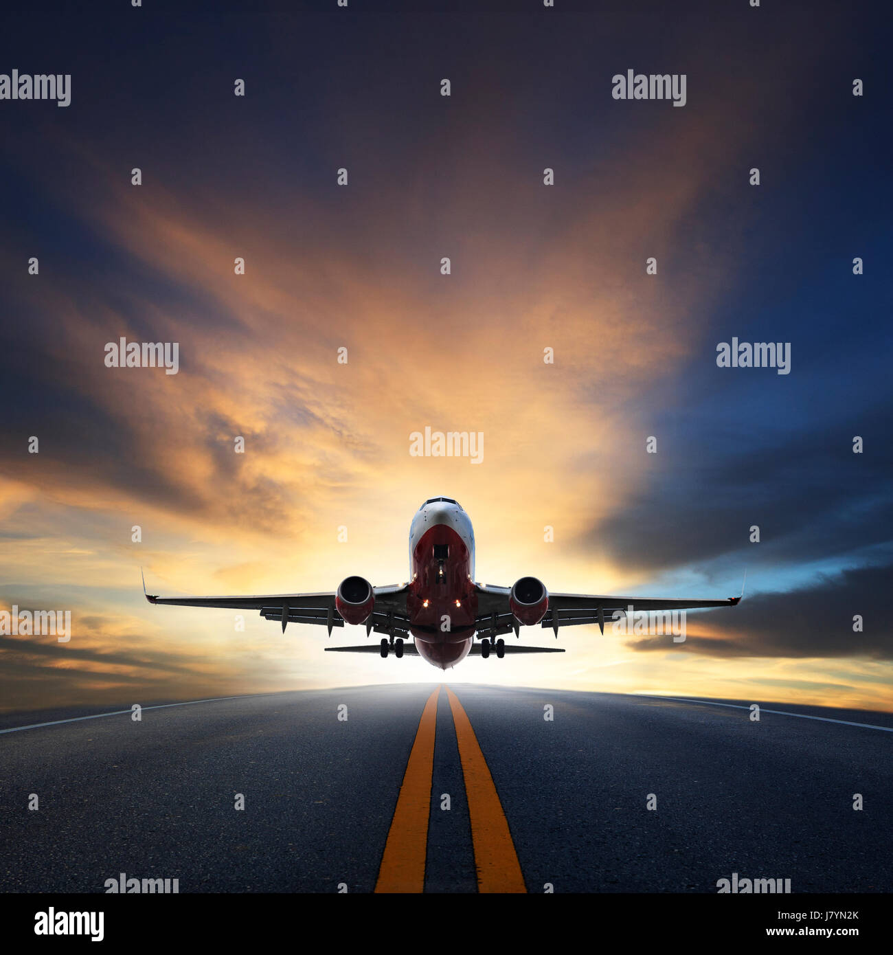 passenger plane take off from runways against beautiful dusky sky with ...