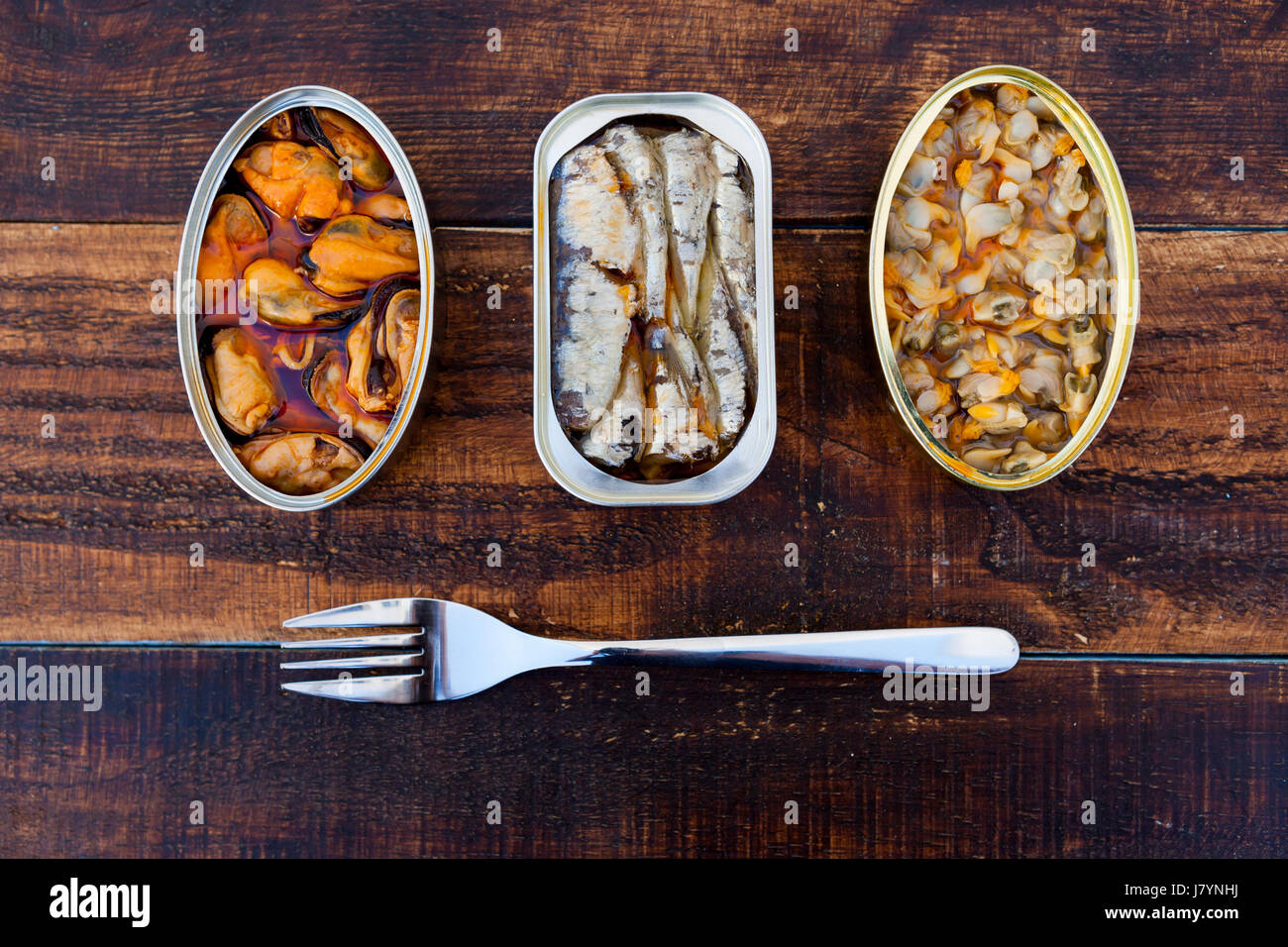 Different cans of canned. Healthy meal Stock Photo - Alamy