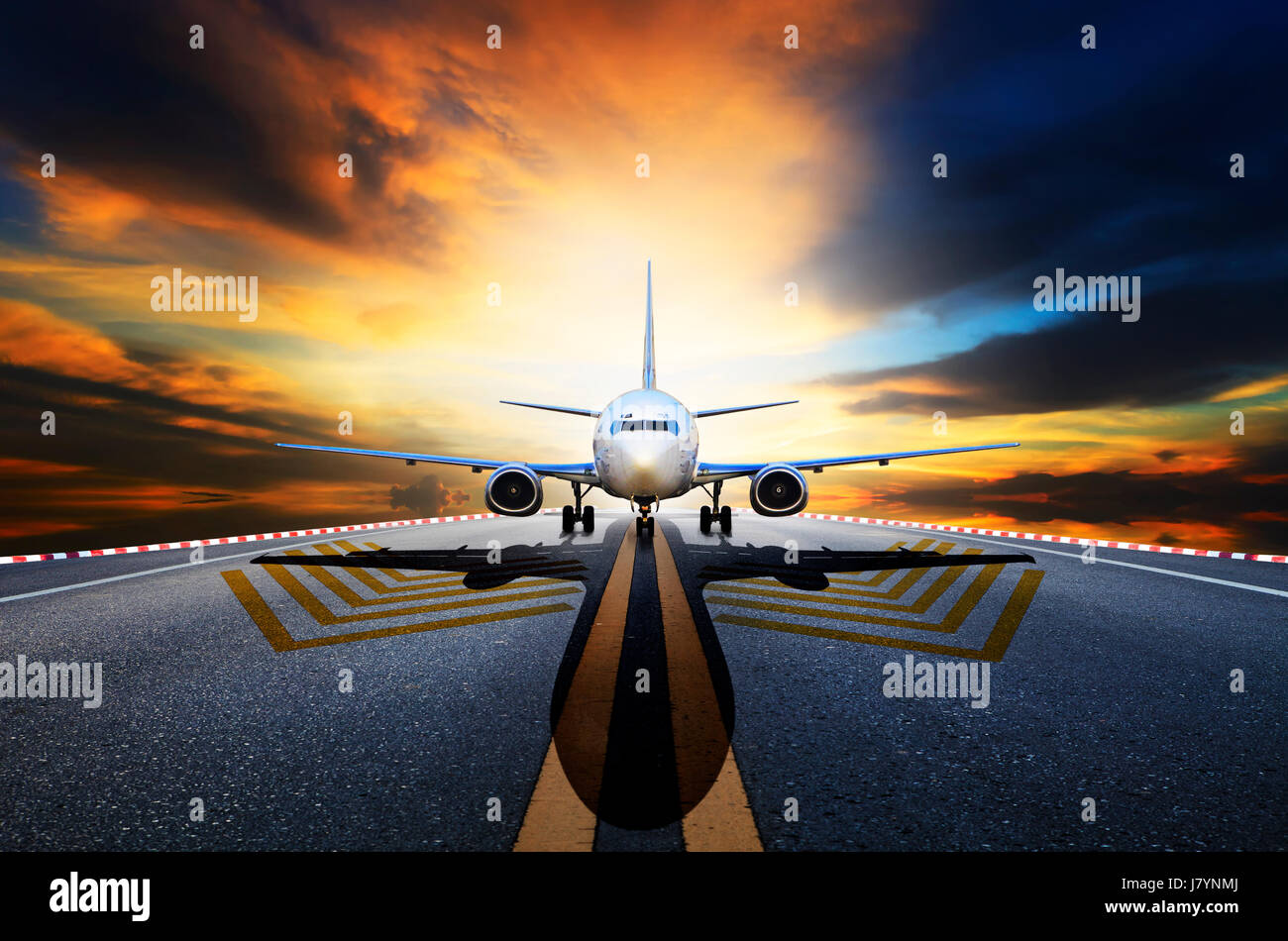 passenger jet plane preparing to take off from airport runways against ...