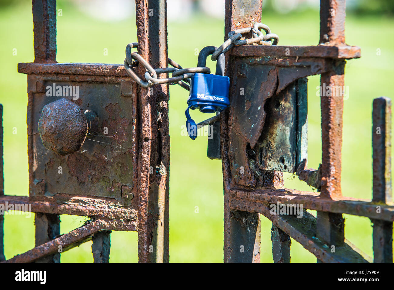 Old rusty gates with chain and padlock. Old entrance to Southend High ...