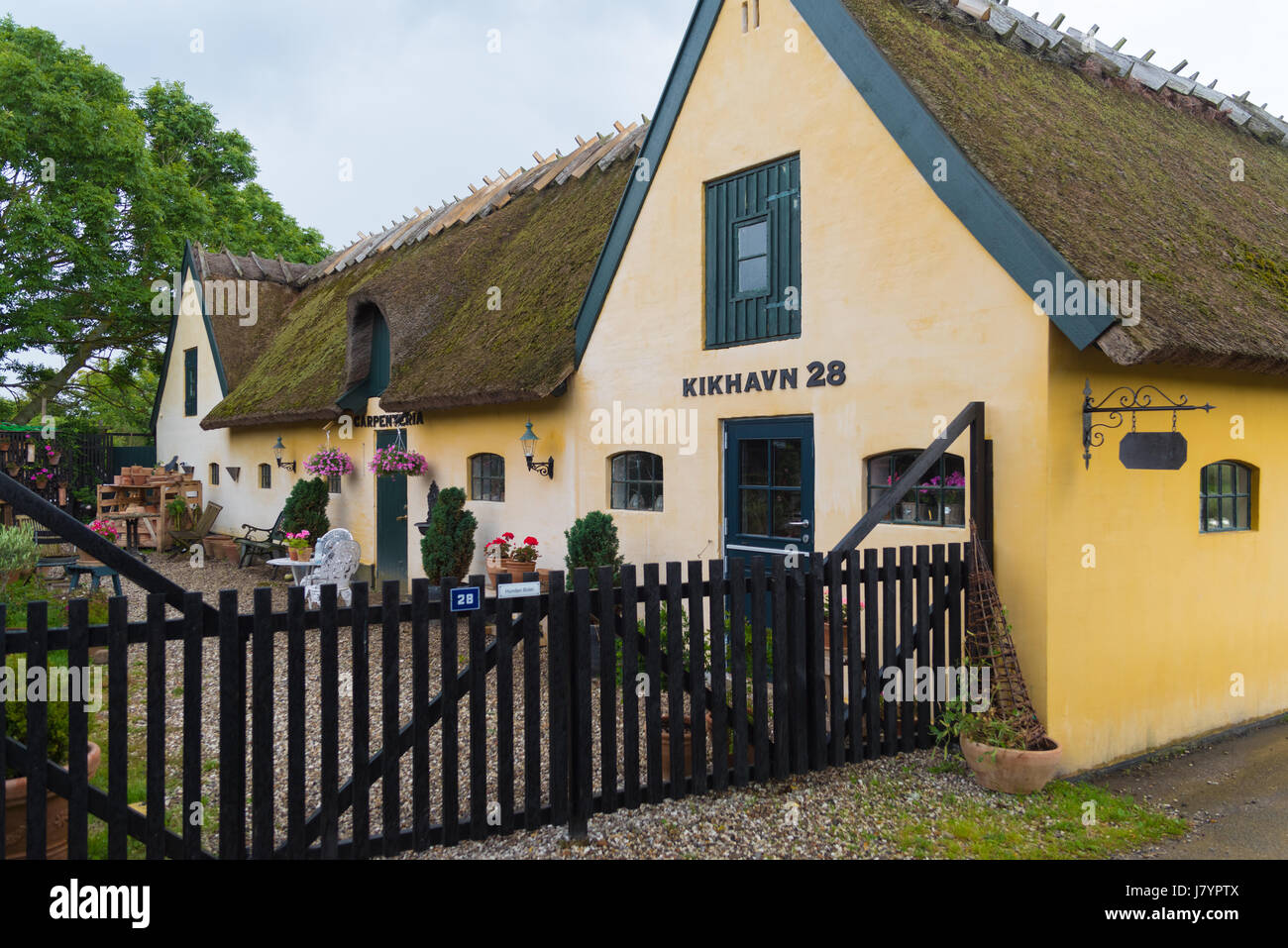 KIKHAVN, DENMARK - AUGUST 4, 2016: Typical danish house in the old ...