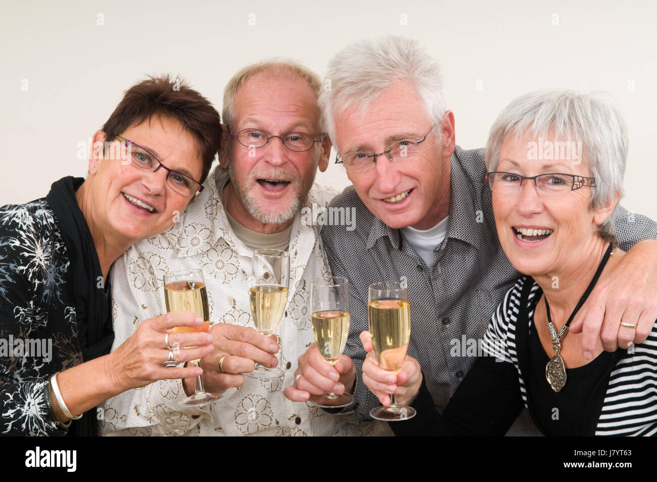 wine cheers champagne couple pair senior senior citizen elderly person ...