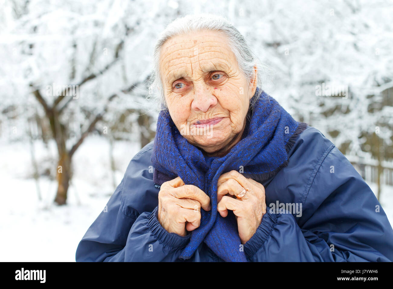 Old people feeling cold hi-res stock photography and images - Alamy