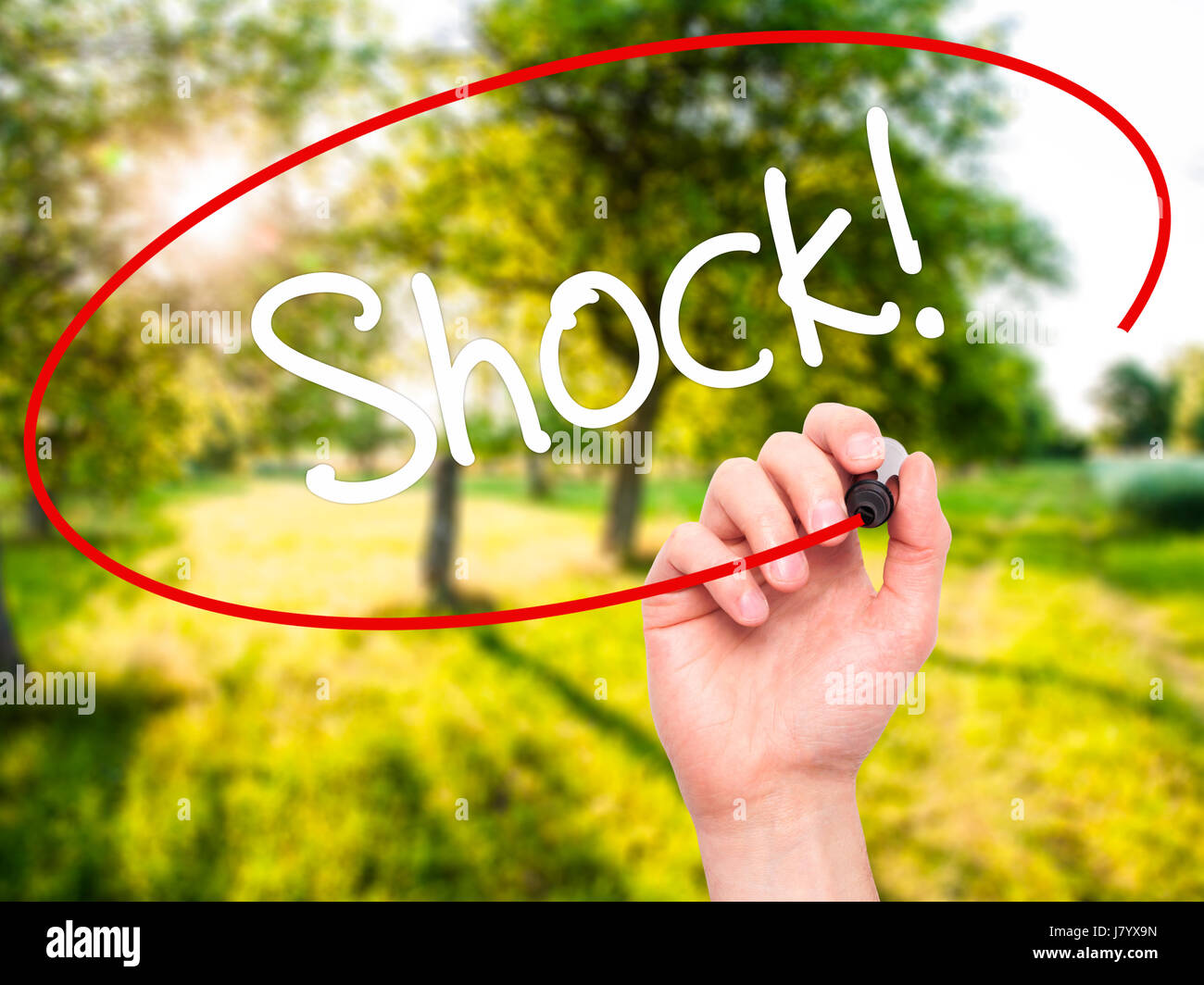 Man Hand writing Shock! with black marker on visual screen. Isolated on ...