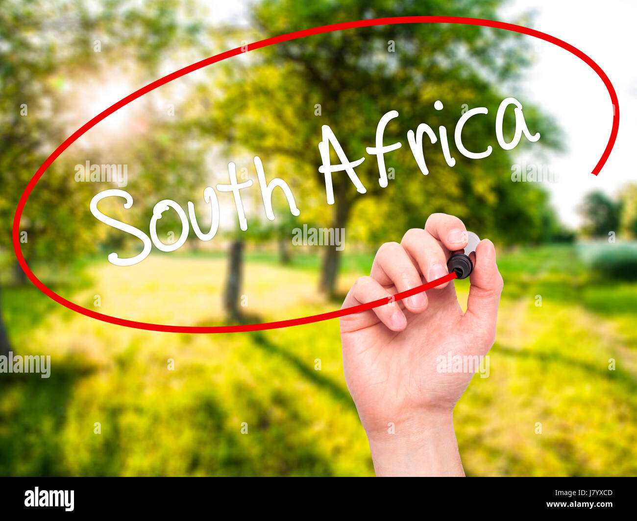 Man Hand writing South Africa with black marker on visual screen ...