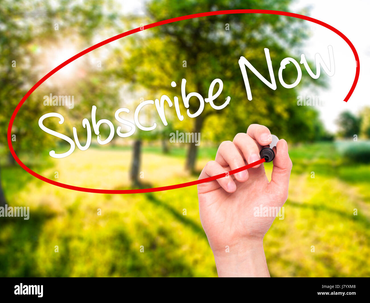 Man Hand writing Subscribe Now with black marker on visual screen ...