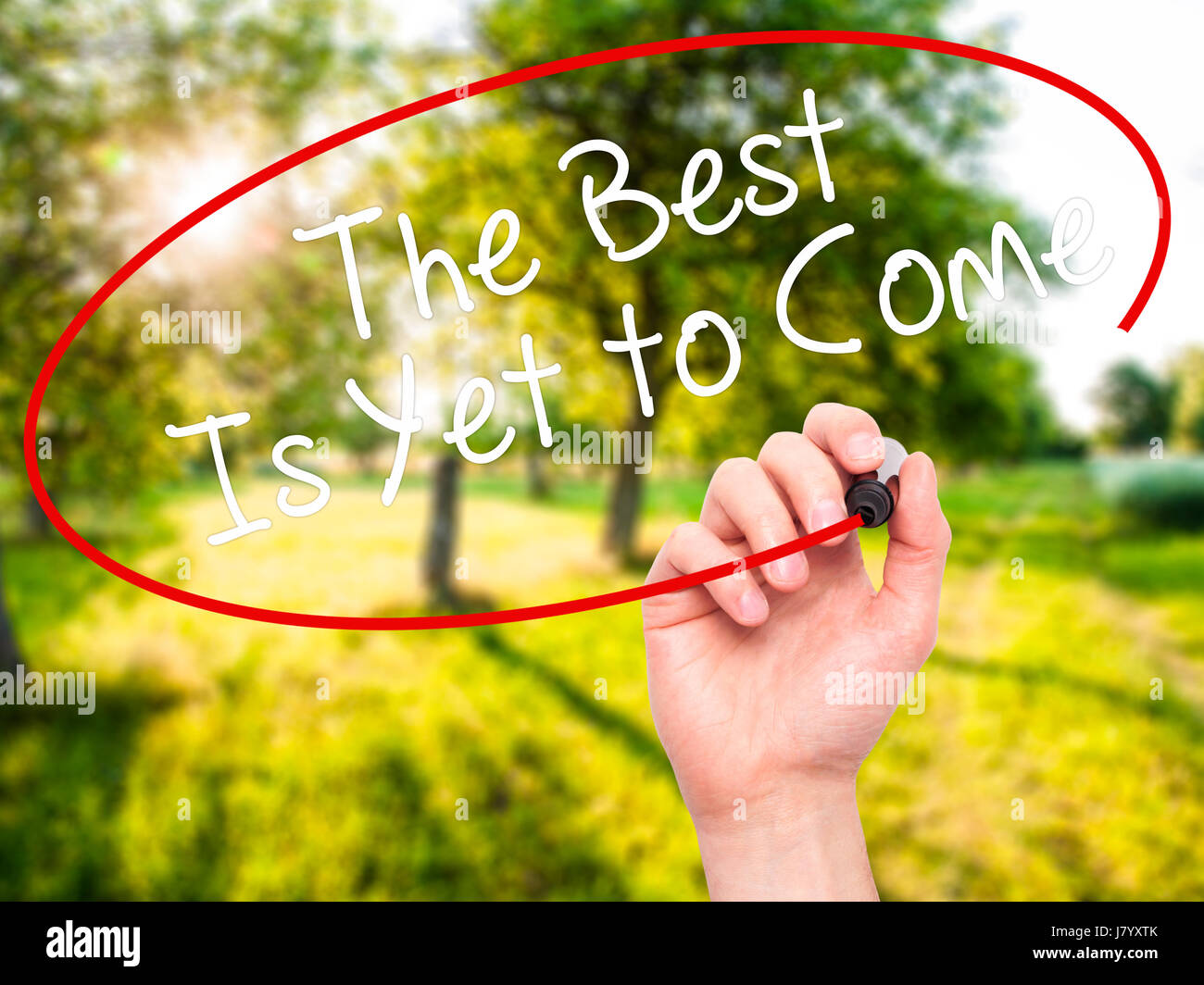 Man Hand writing The Best Is Yet to Come with black marker on visual ...