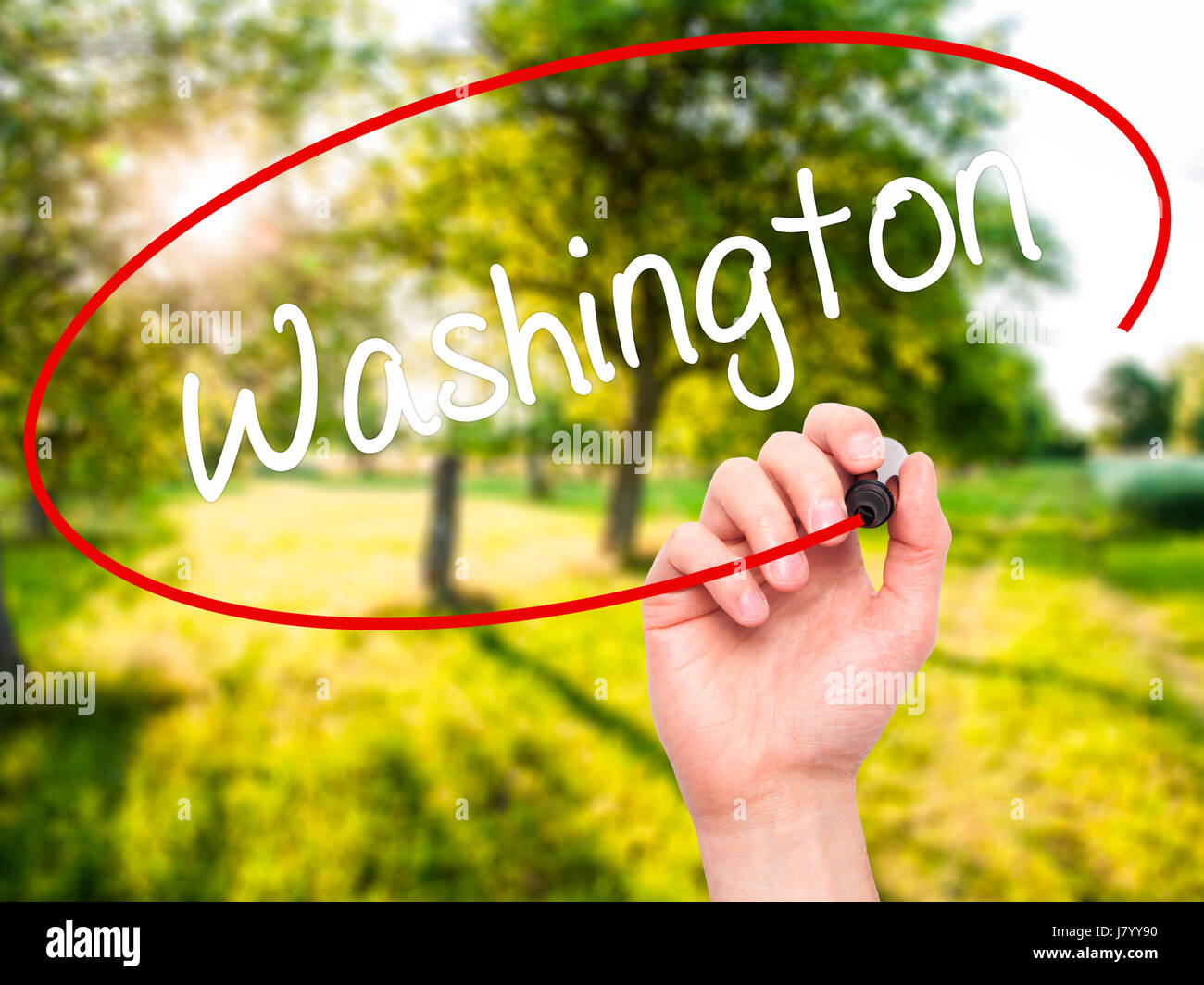 Man Hand writing Washington with black marker on visual screen ...