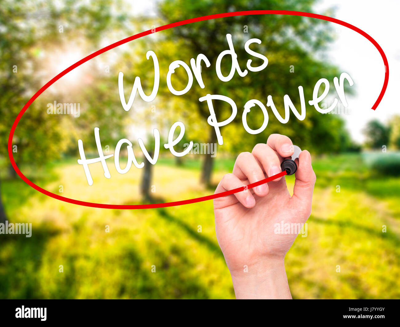 Man Hand writing Words Have Power with black marker on visual screen ...