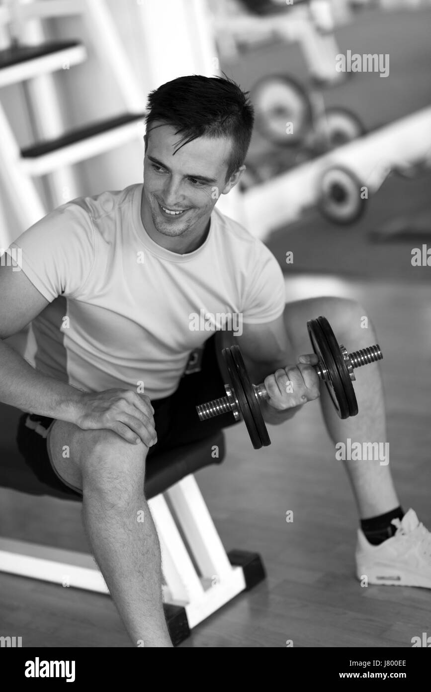 Man working out at a gym Black and White Stock Photos & Images - Alamy