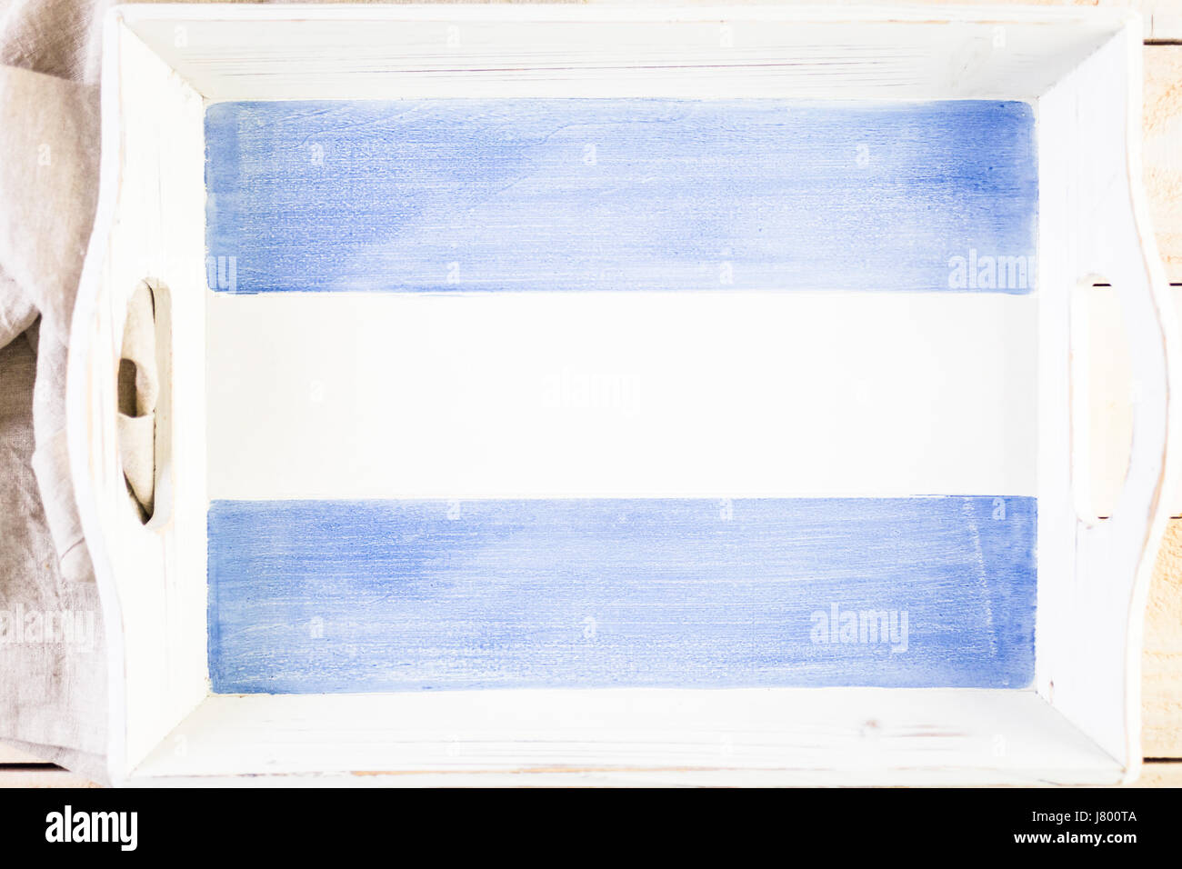 Empty wood serving tray painted with white and vlue Stock Photo - Alamy