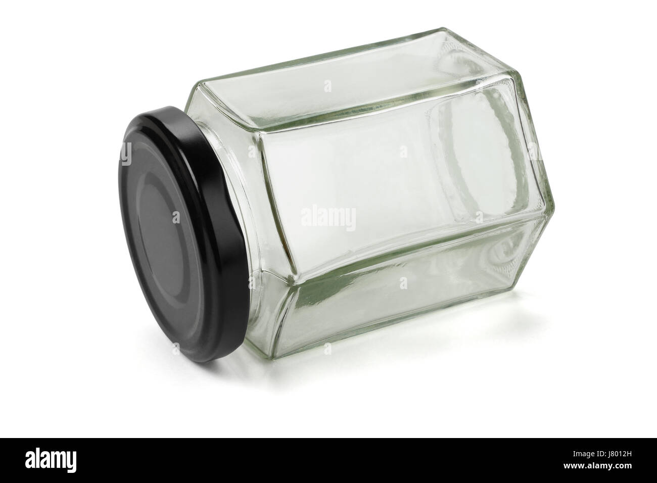 Hexagonal Shape Glass Jar Lying on White Background Stock Photo - Alamy