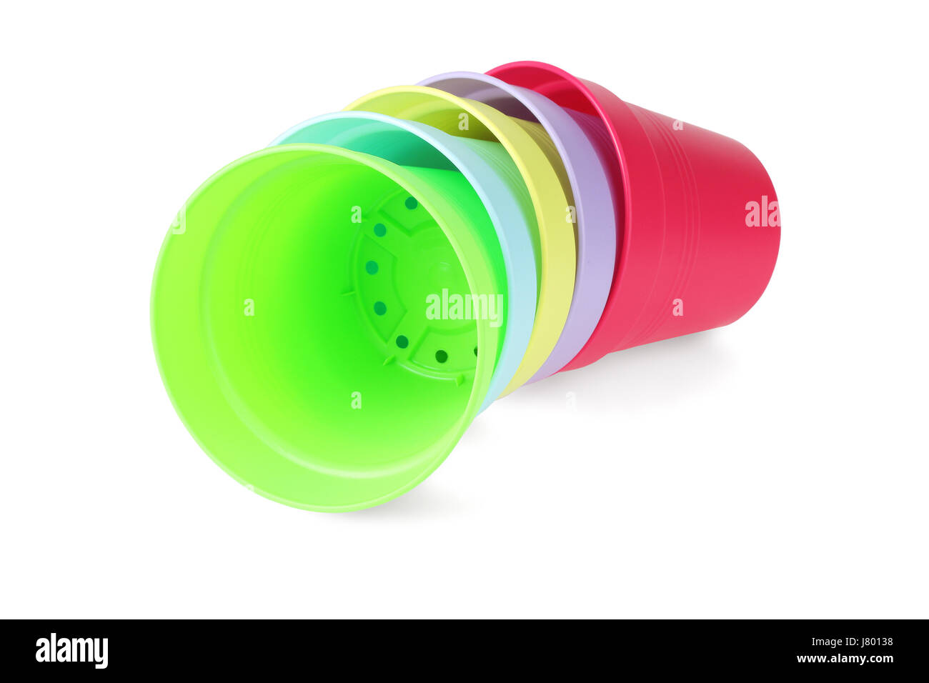 Plastic Colourful Flower Pots Lying on White Background Stock Photo - Alamy