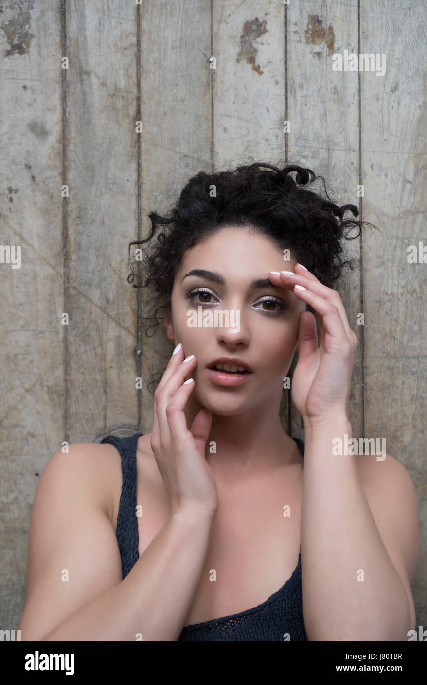 Woman laying down scared hi-res stock photography and images - Alamy