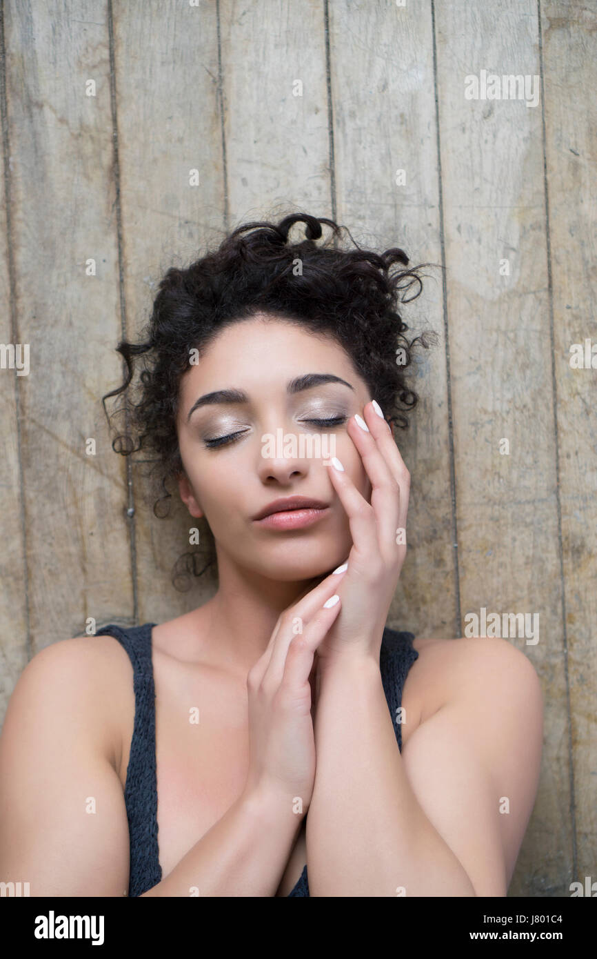 Laying face down woman eyes closed hi-res stock photography and images ...