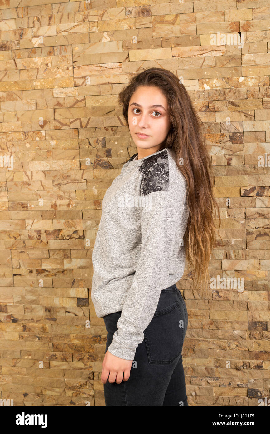 Pretty girl looking over shoulder hi-res stock photography and images ...