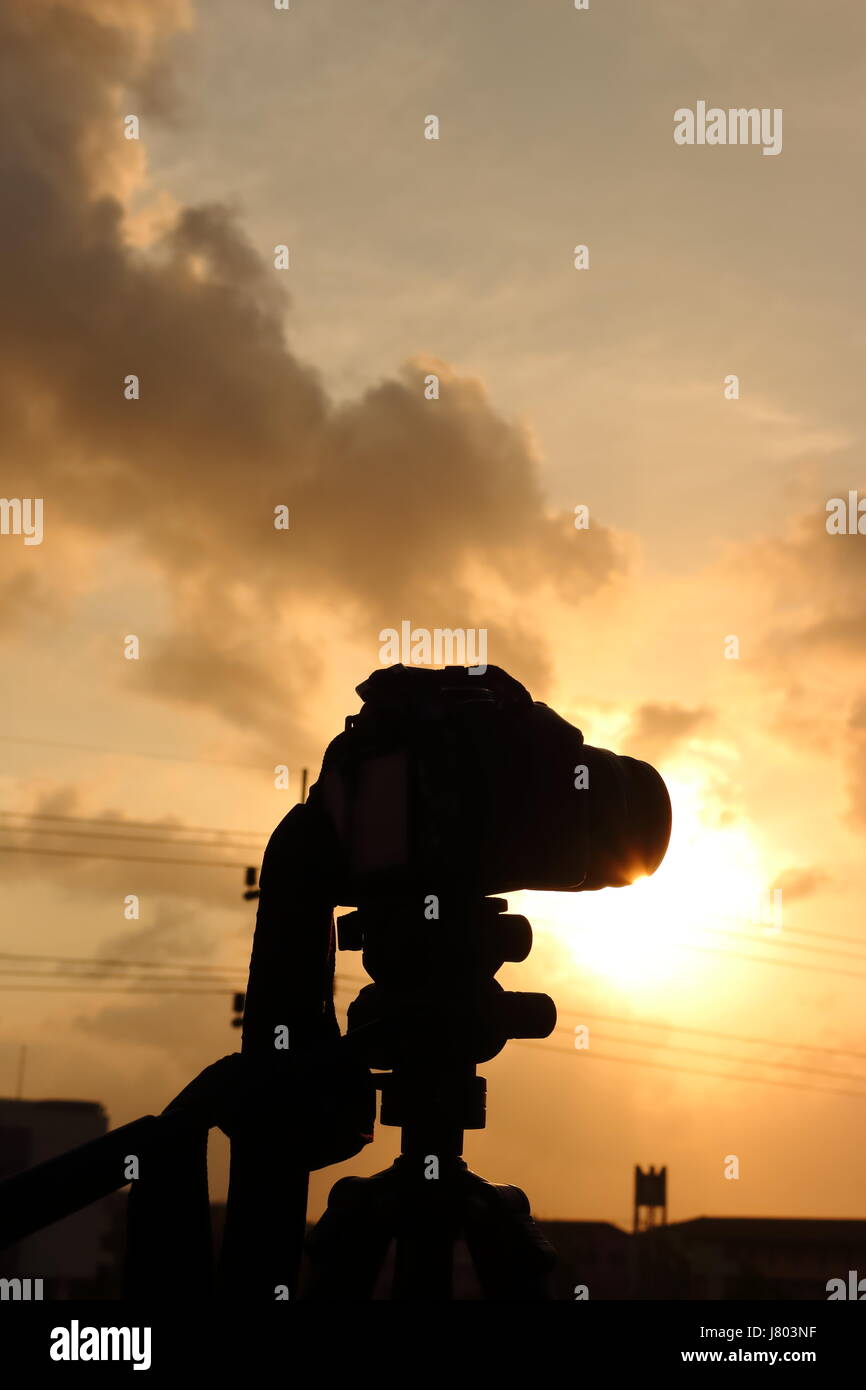 silhouette camera background sunset Stock Photo - Alamy