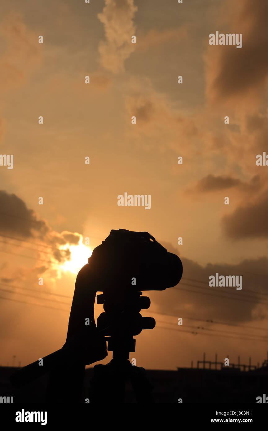 silhouette camera background sunset Stock Photo - Alamy