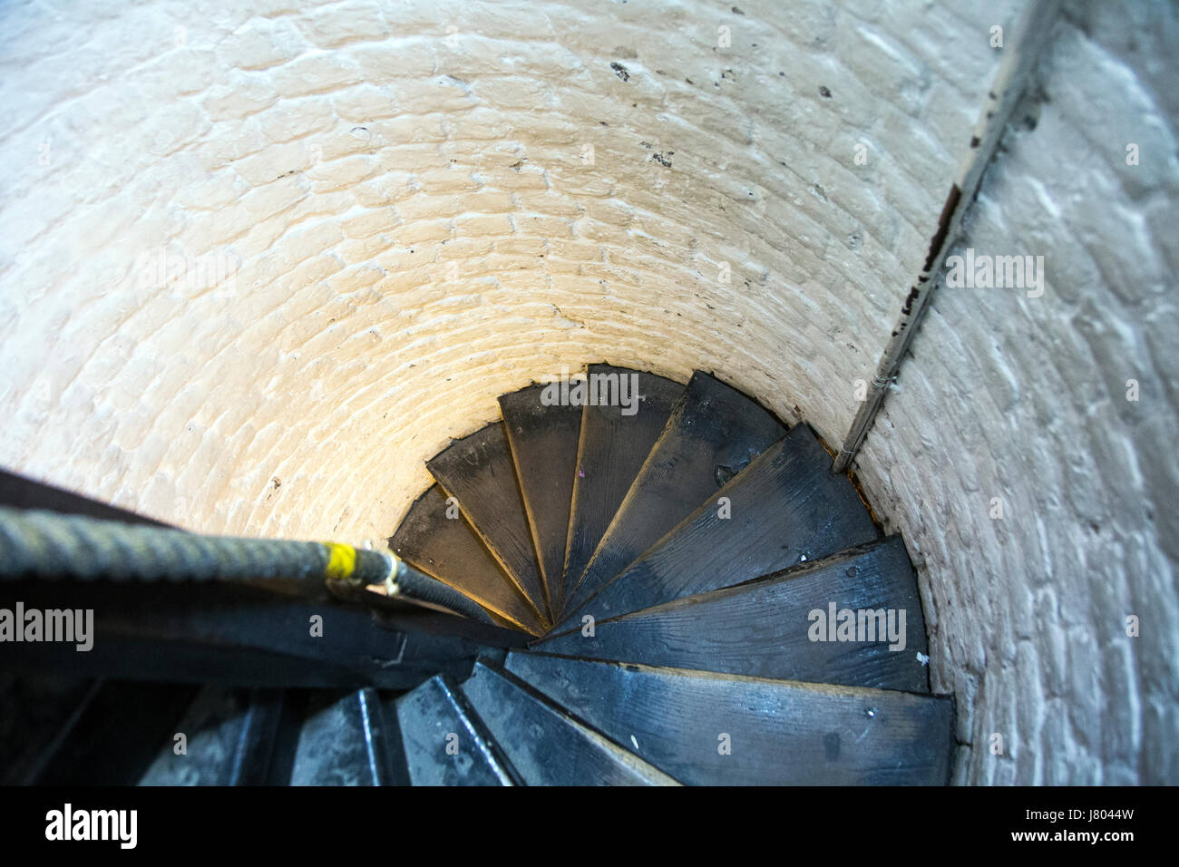Narrow spiral staircase indoors Stock Photo - Alamy