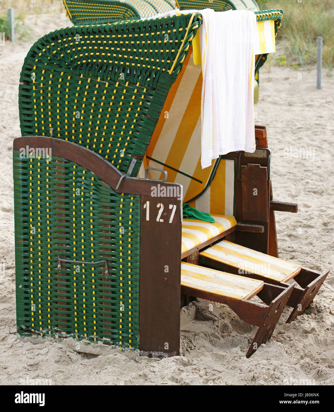 beach chair in the sand - beach chair green Stock Photo - Alamy