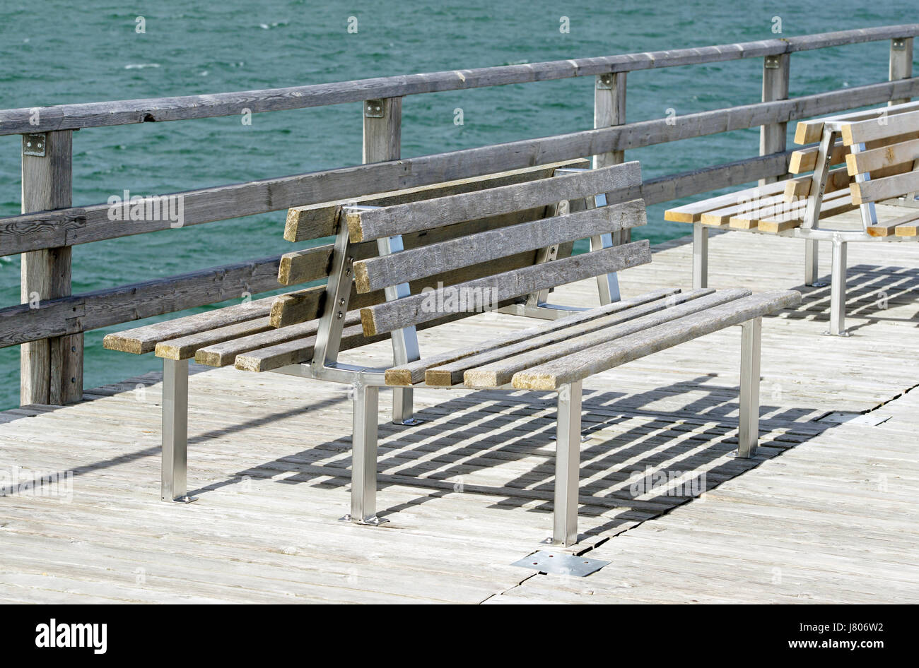 wooden bench by the sea - relax concept Stock Photo - Alamy