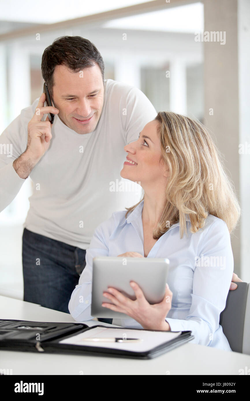 woman office laptop notebook computers computer laugh laughs laughing ...