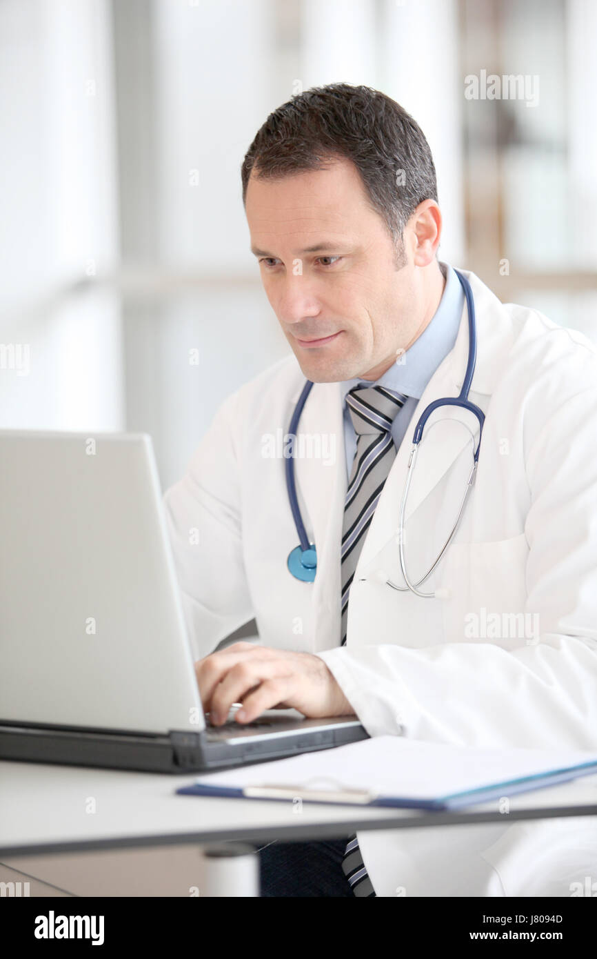doctor physician medic medical practicioner office laptop notebook ...