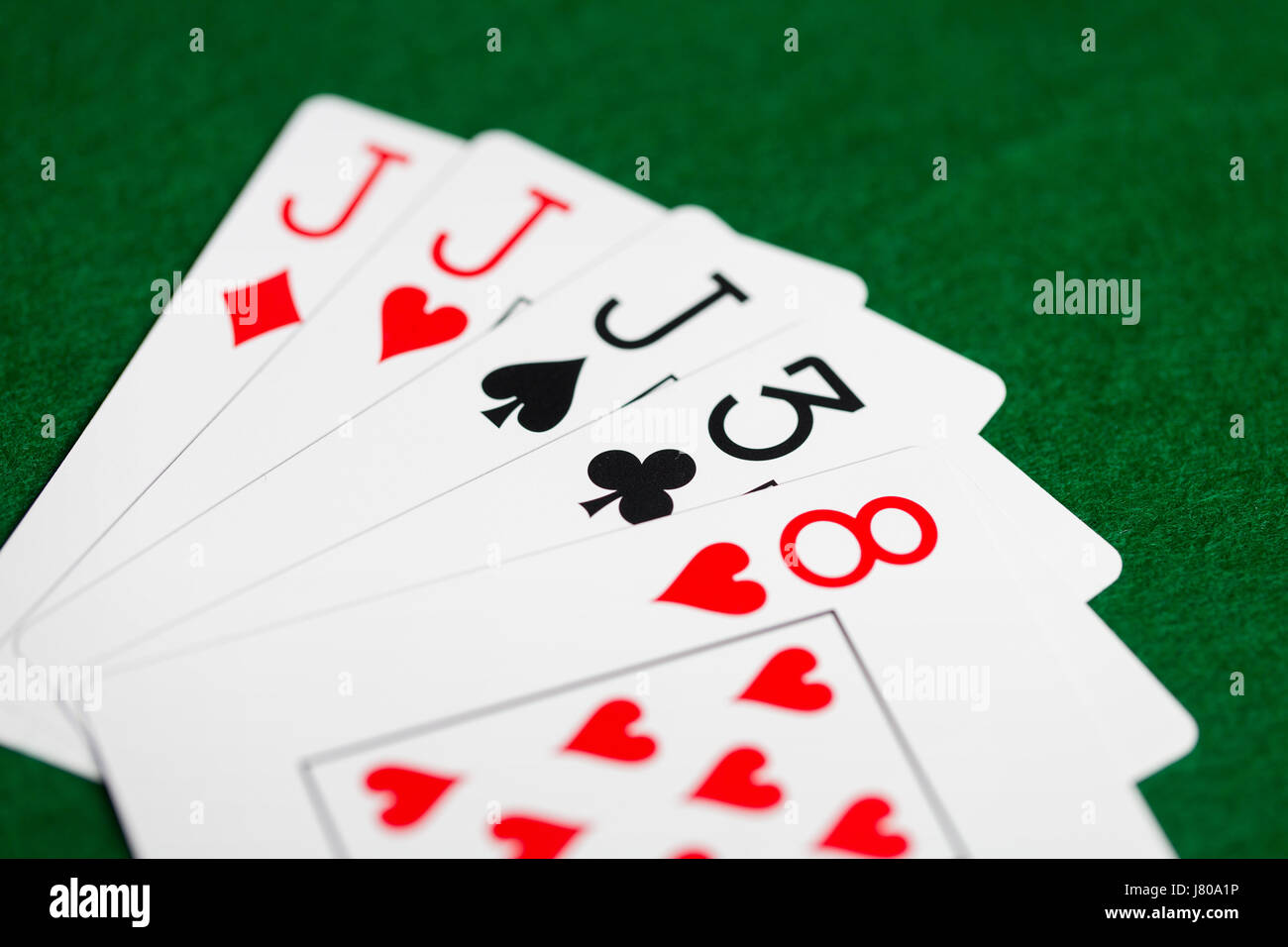 Poker hand three of kind cards hi-res stock photography and images - Alamy