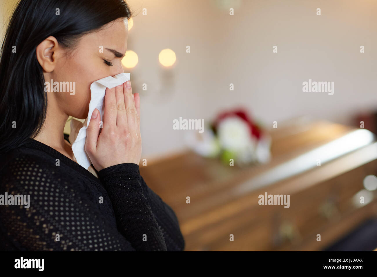 woman crying near coffin at funeral in church Stock Photo - Alamy