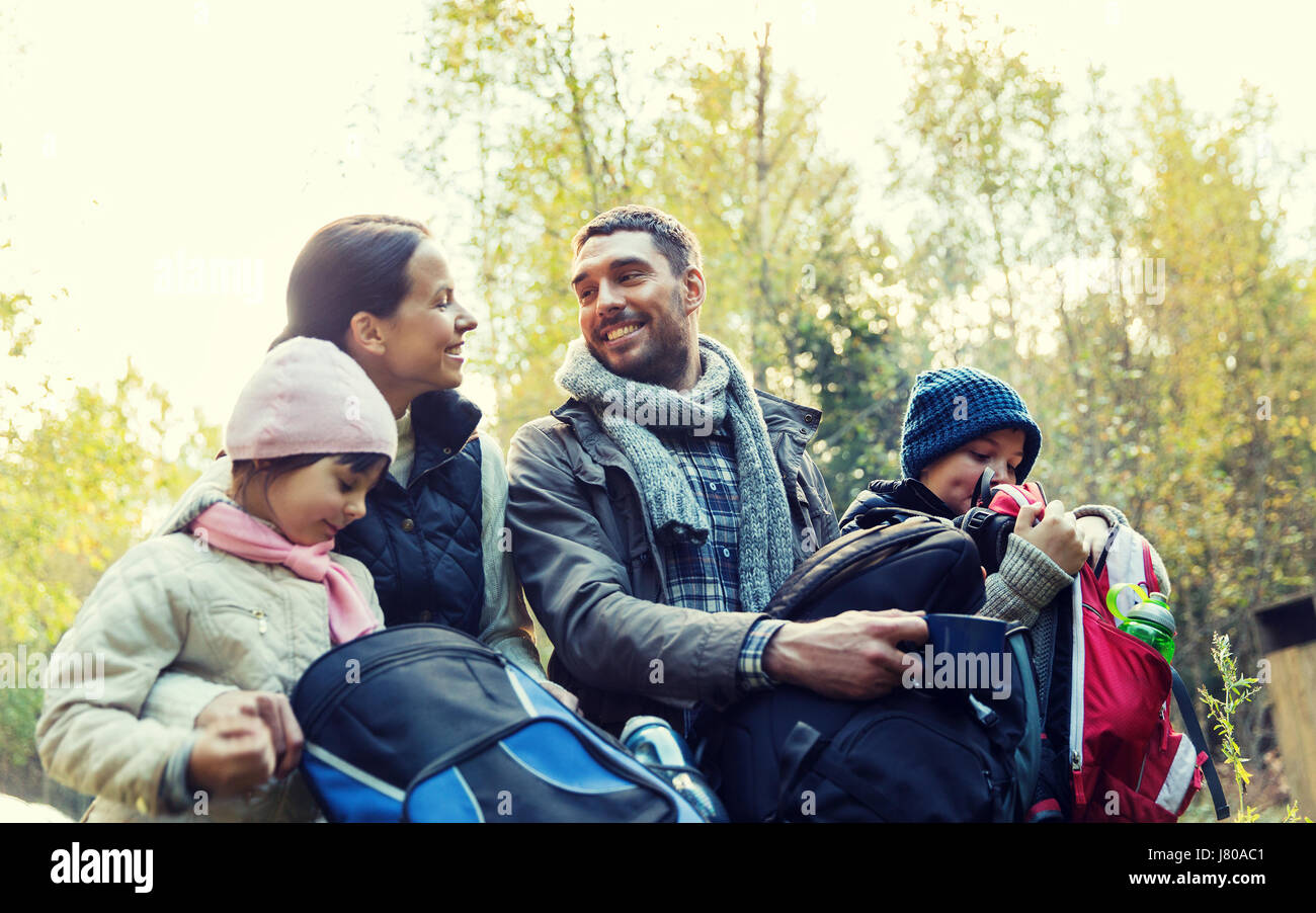 happy family with backpacks at camp Stock Photo - Alamy