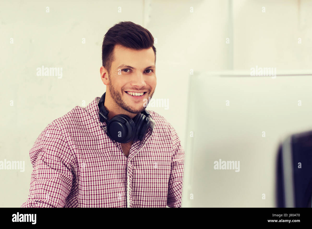 creative man with headphones and computer Stock Photo - Alamy