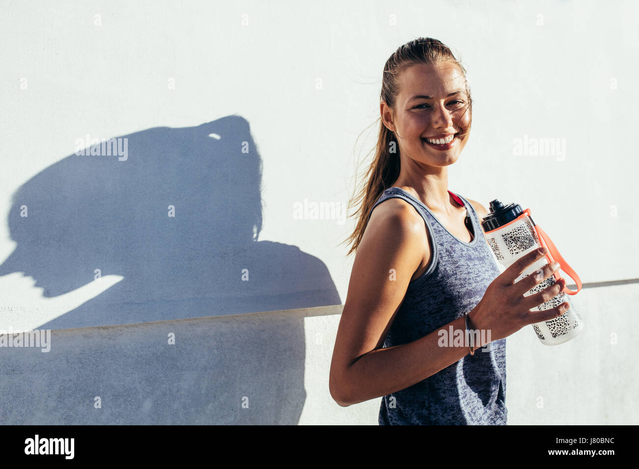 Happy female runner hi-res stock photography and images - Alamy