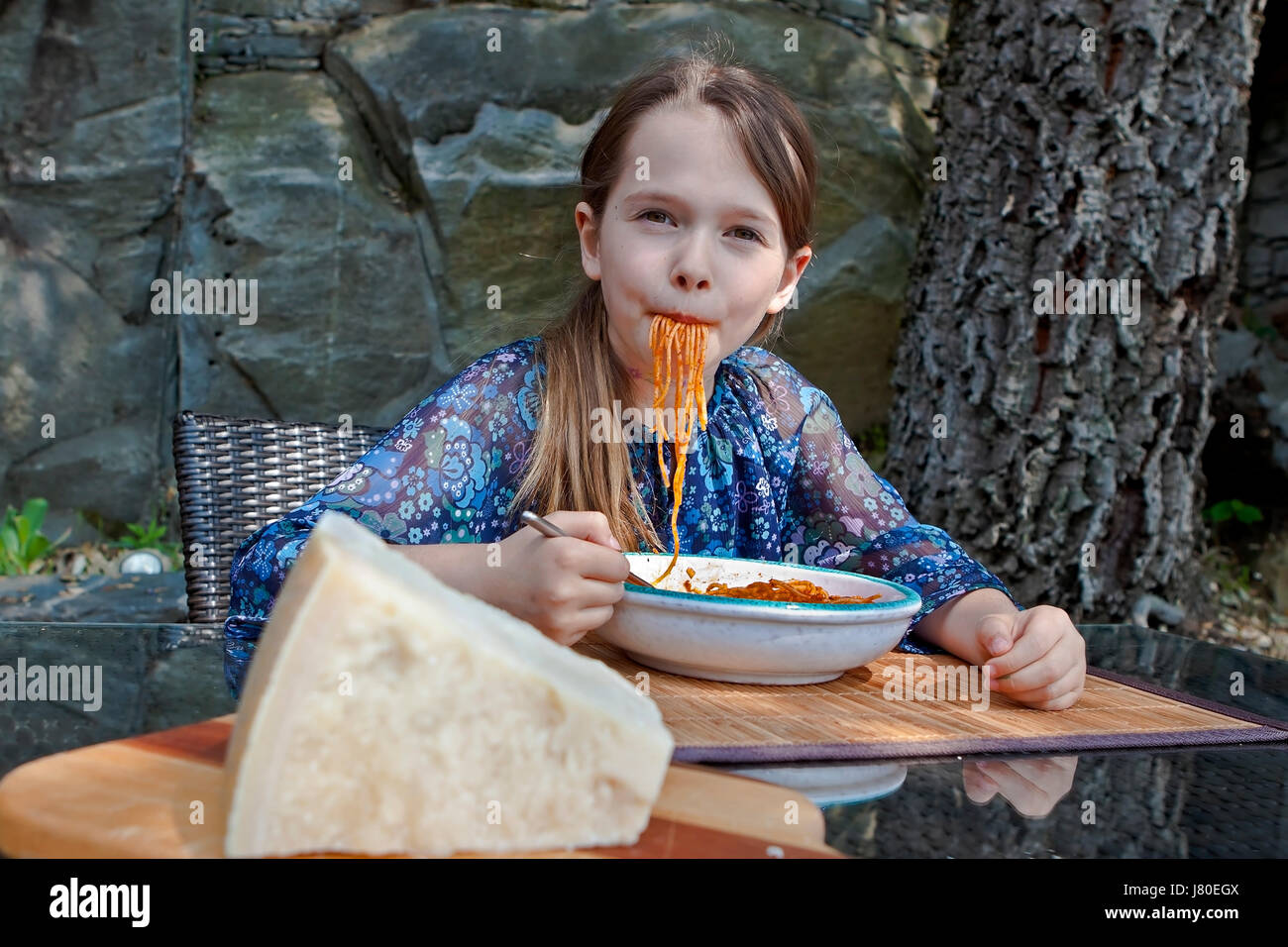 Child eating noodles italy hi-res stock photography and images - Alamy