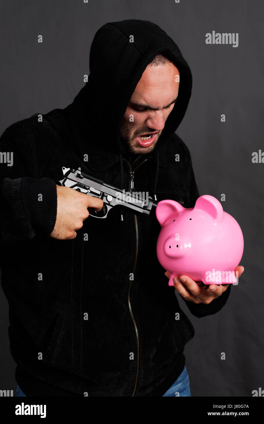Bank robber handgun hi-res stock photography and images - Alamy