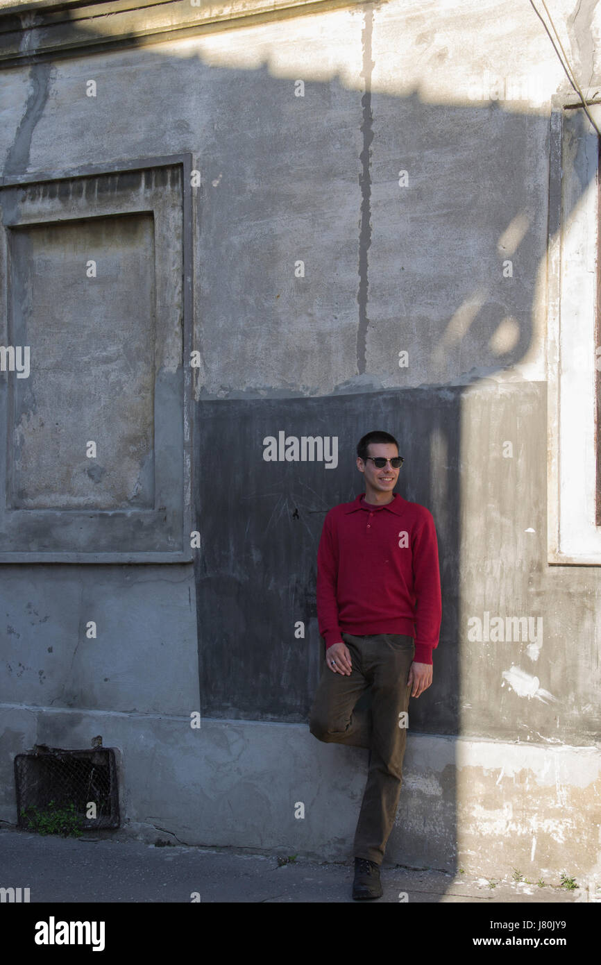 Young Man Standing On The Street Stock Photo - Alamy