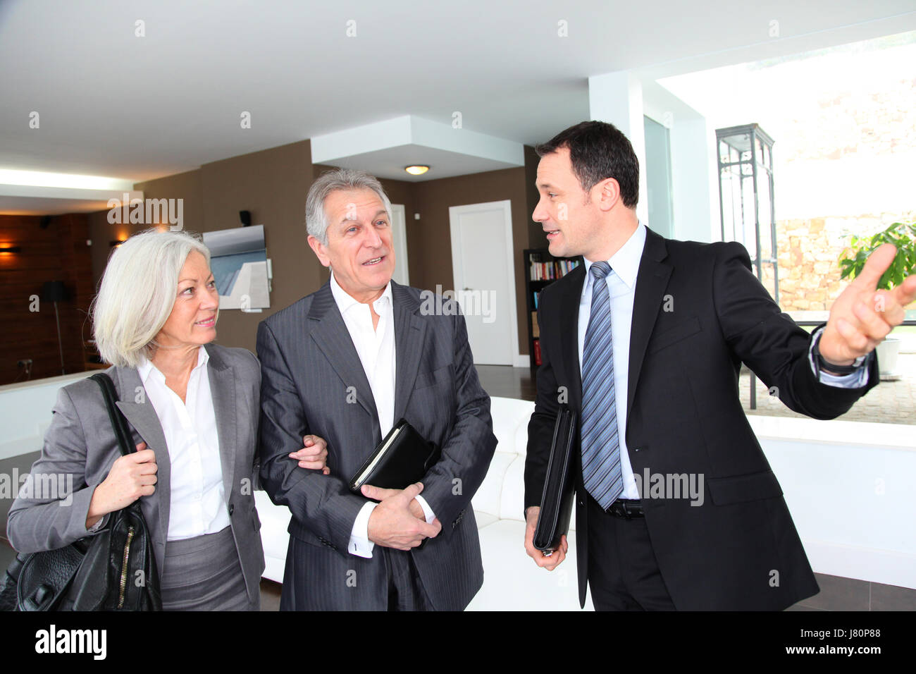 woman house building modern modernity interior seniors senior citizens ...