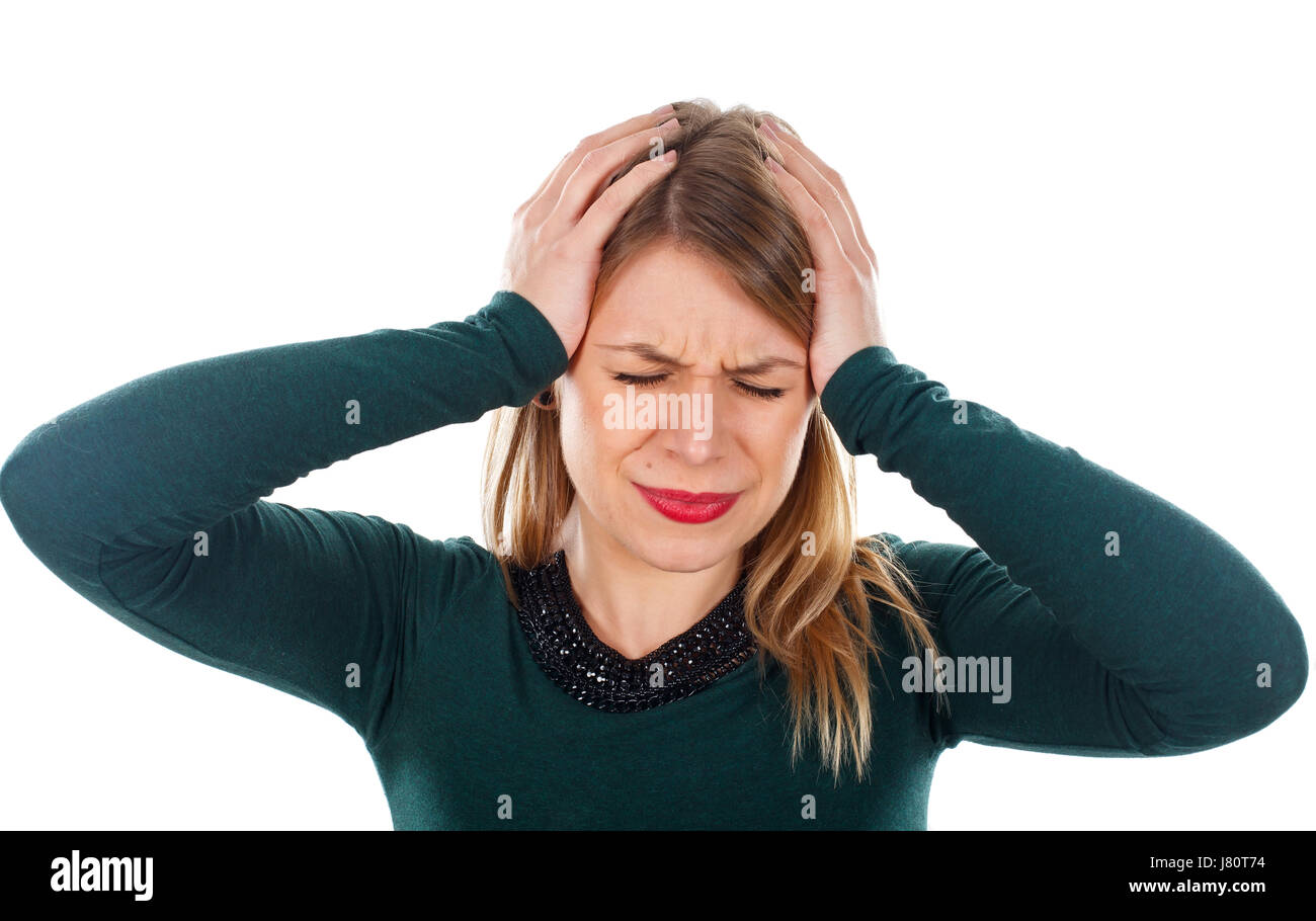 Picture of a young woman having a headache standing on an isolated ...