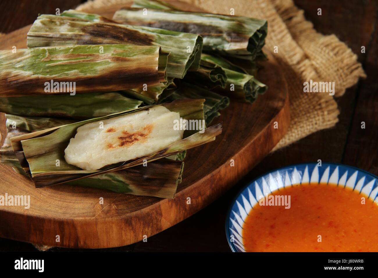 Otak-otak, Indonesian fish cake wrapped in banana leaf. A popular snack ...