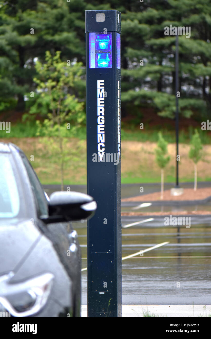 Campus parking lot hosts blue light pole for safety Stock Photo - Alamy