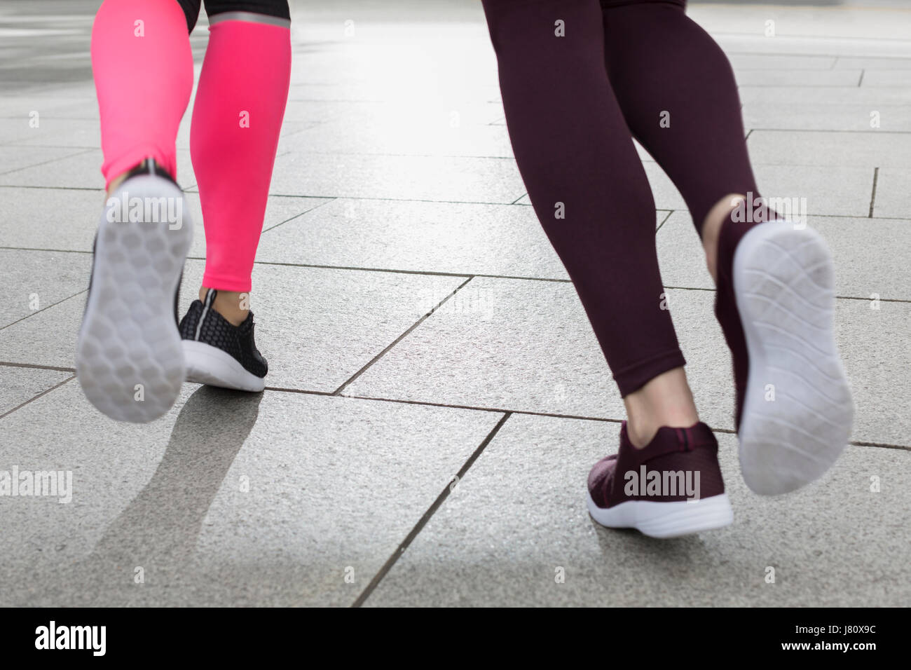 Woman jogging feet mature hi-res stock photography and images - Alamy