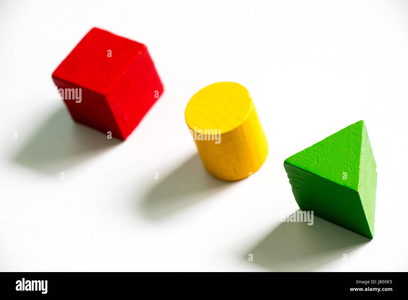 Set of colorful wooden shape toy (Square, triangle, round) on white ...