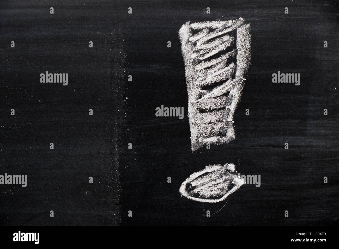 Exclamation mark draw by white chalk on black board background Stock ...
