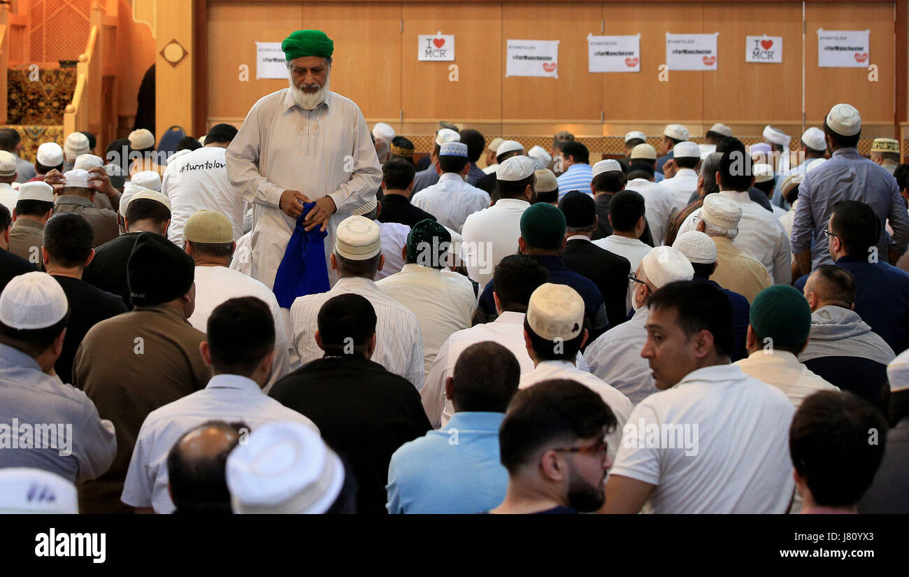 Men attend friday prayers hi-res stock photography and images - Alamy
