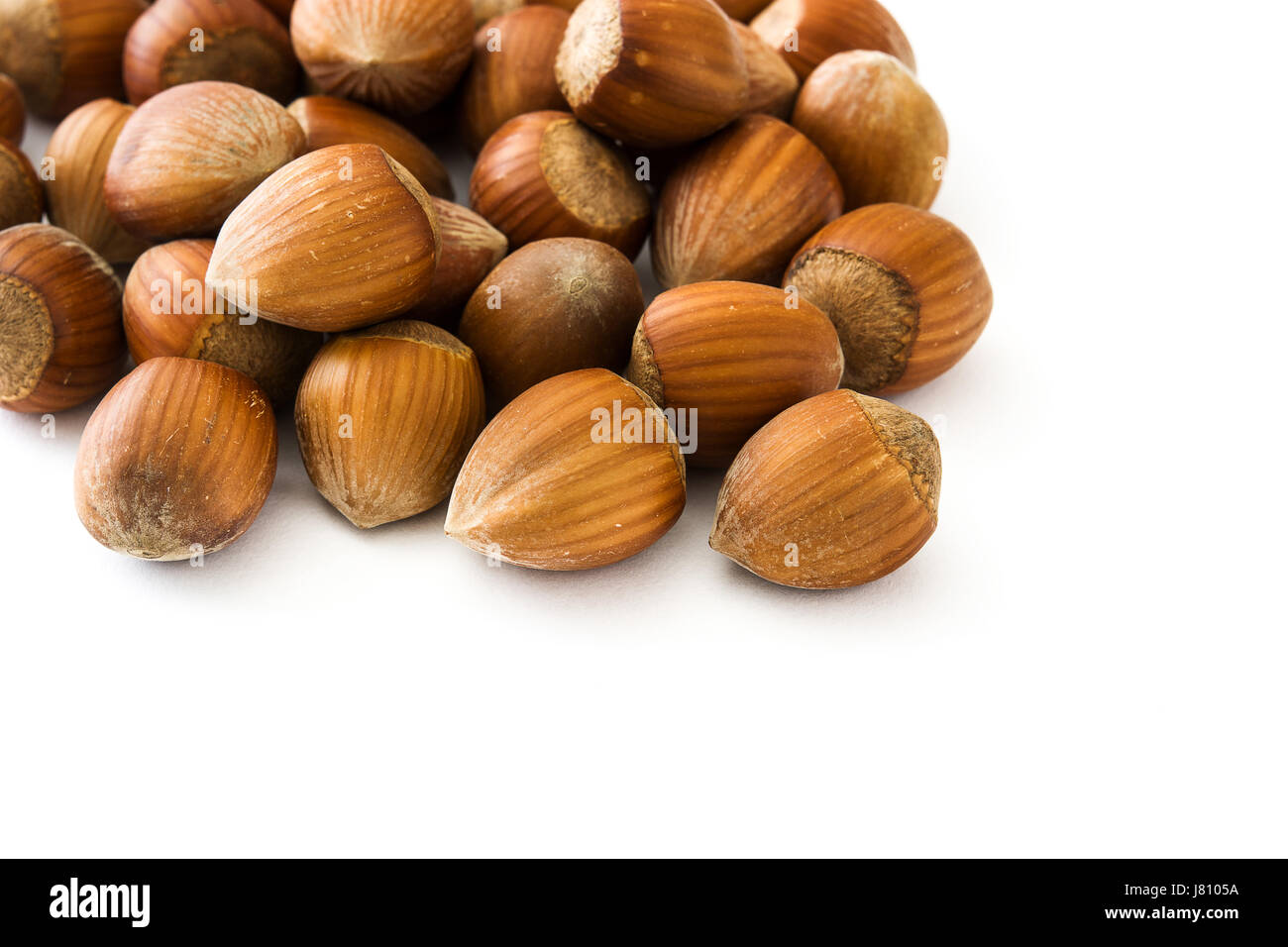 Hazelnuts isolated on white background Stock Photo - Alamy