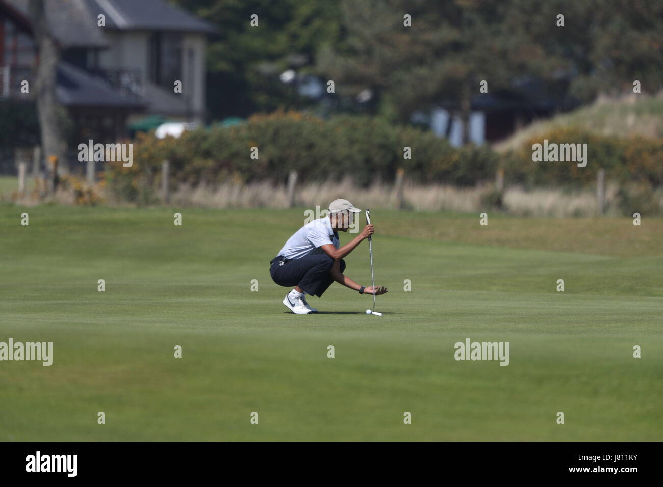 Former US president Barack Obama playing a round of golf at the Old ...