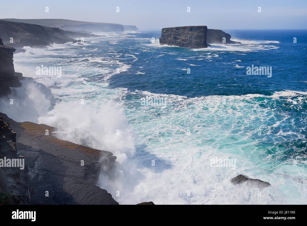 Ireland, County Clare, Dramatic cliff scenery at the feature known as ...