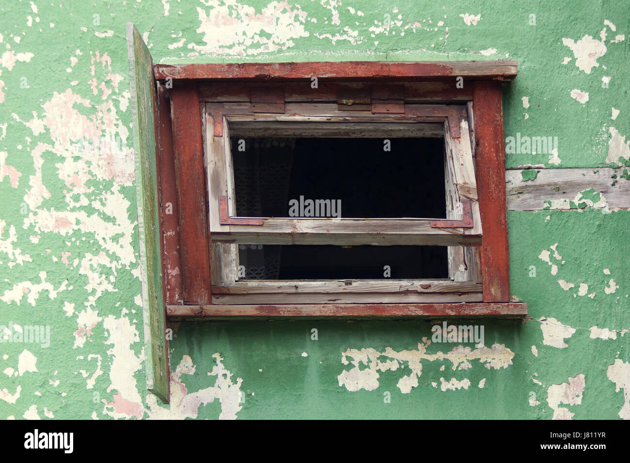 window in abandoned house broken. building where there are no people ...