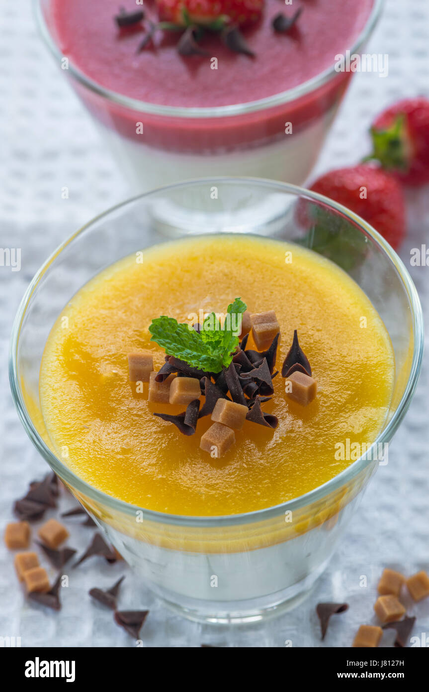 Mango and strawberry panna cotta - traditional Italian dessert Stock ...