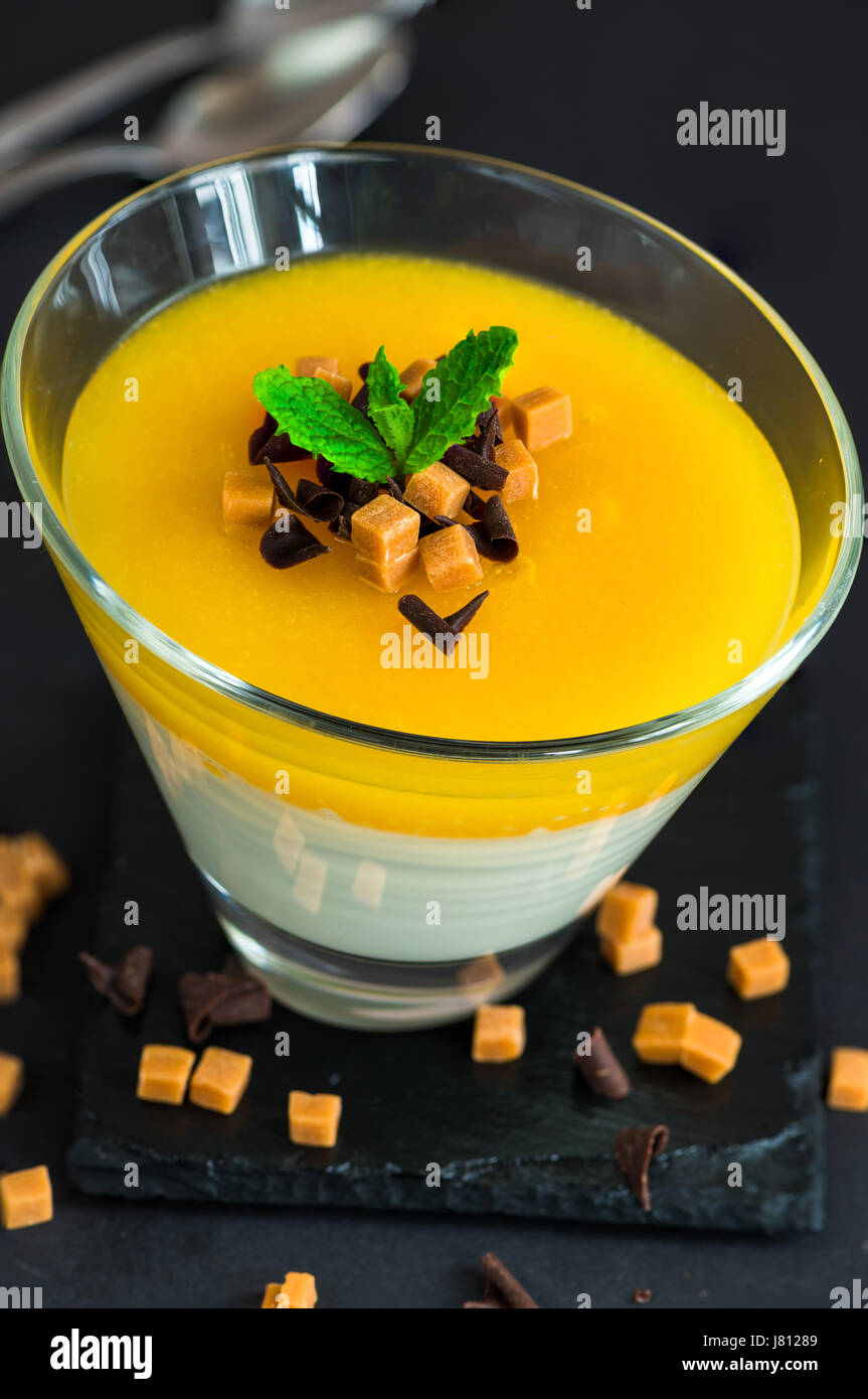 Mango panna cotta - traditional Italian dessert Stock Photo - Alamy