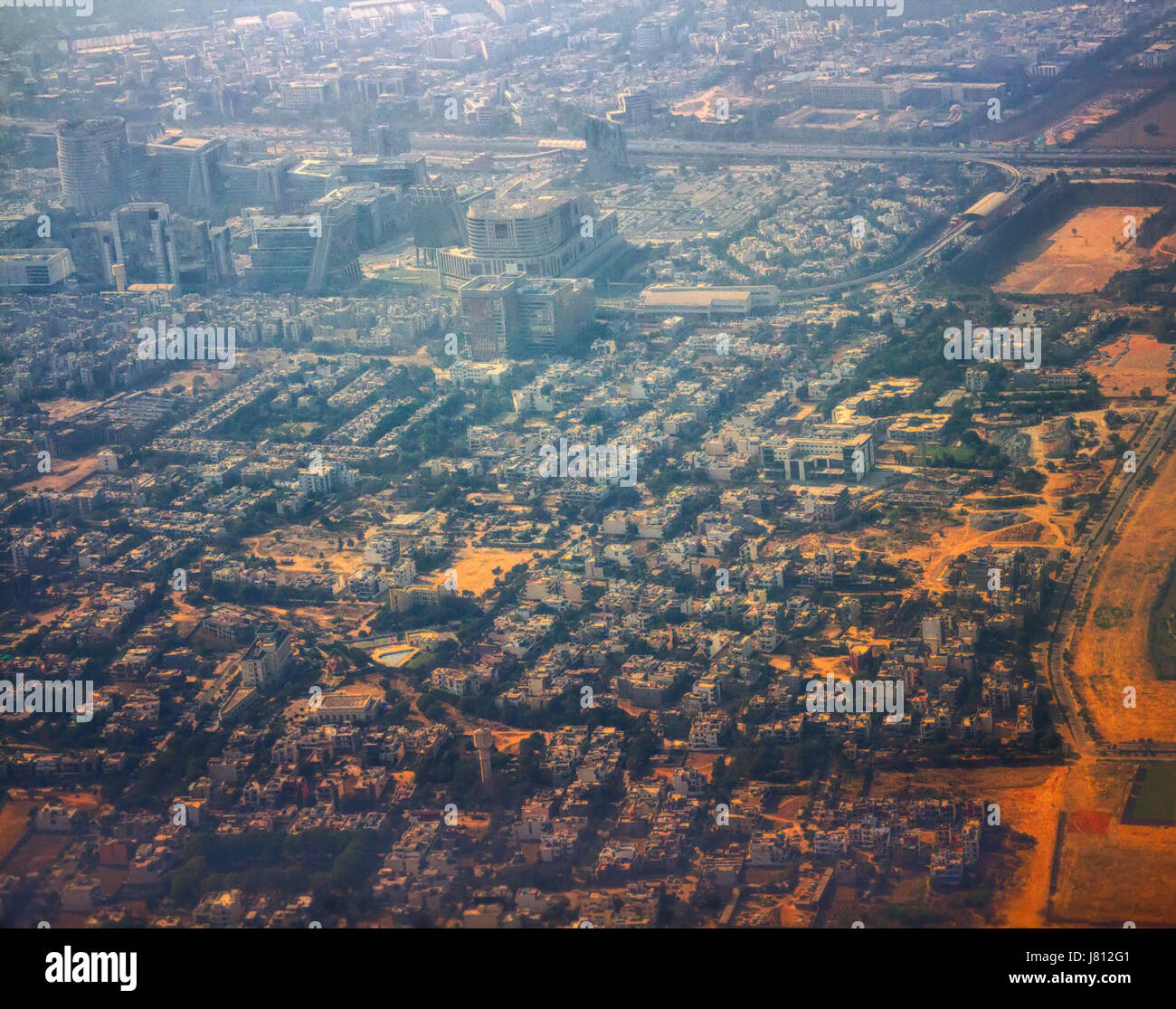 Journey by air. A view of city from plane. City Of India (North of ...